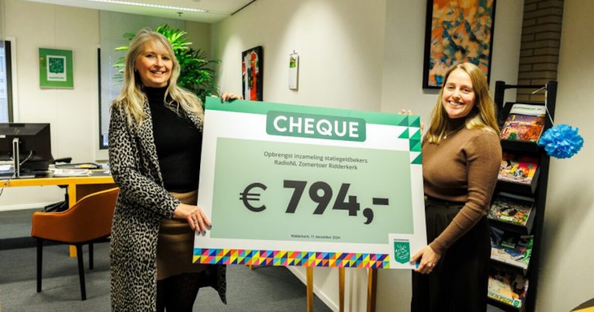 Cheque van ruim 700 euro voor Voedselbank Ridderkerk | Ridderkerk | AD.nl