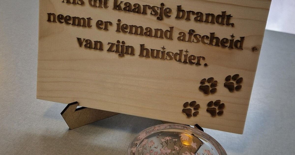 Deze dierenartspraktijk laat een kaarsje op de balie branden als een ...