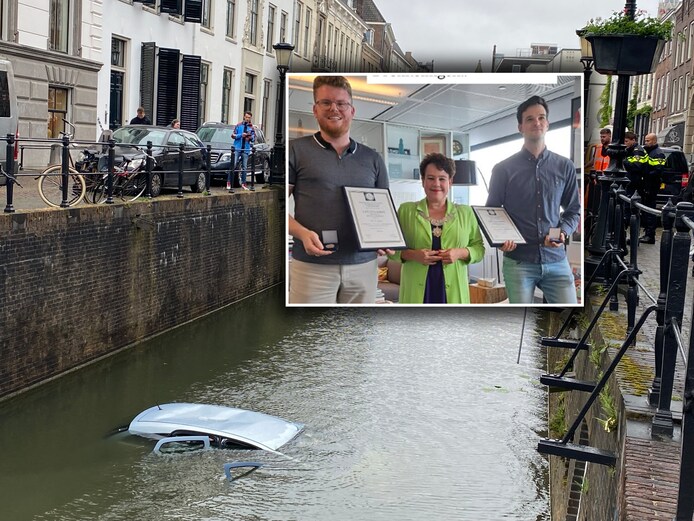 Medaille voor Bas en Rowan die vrouw en kind uit Plompetorengracht ...