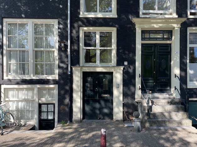 Toen in: achter deze deur aan de Prinsengracht zat vroeger een pretpark ...