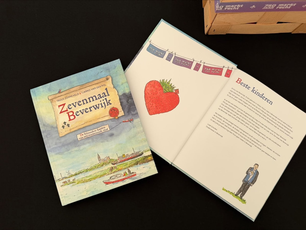 Beverwijkse kinderen krijgen jubileumboek cadeau | Foto | AD.nl